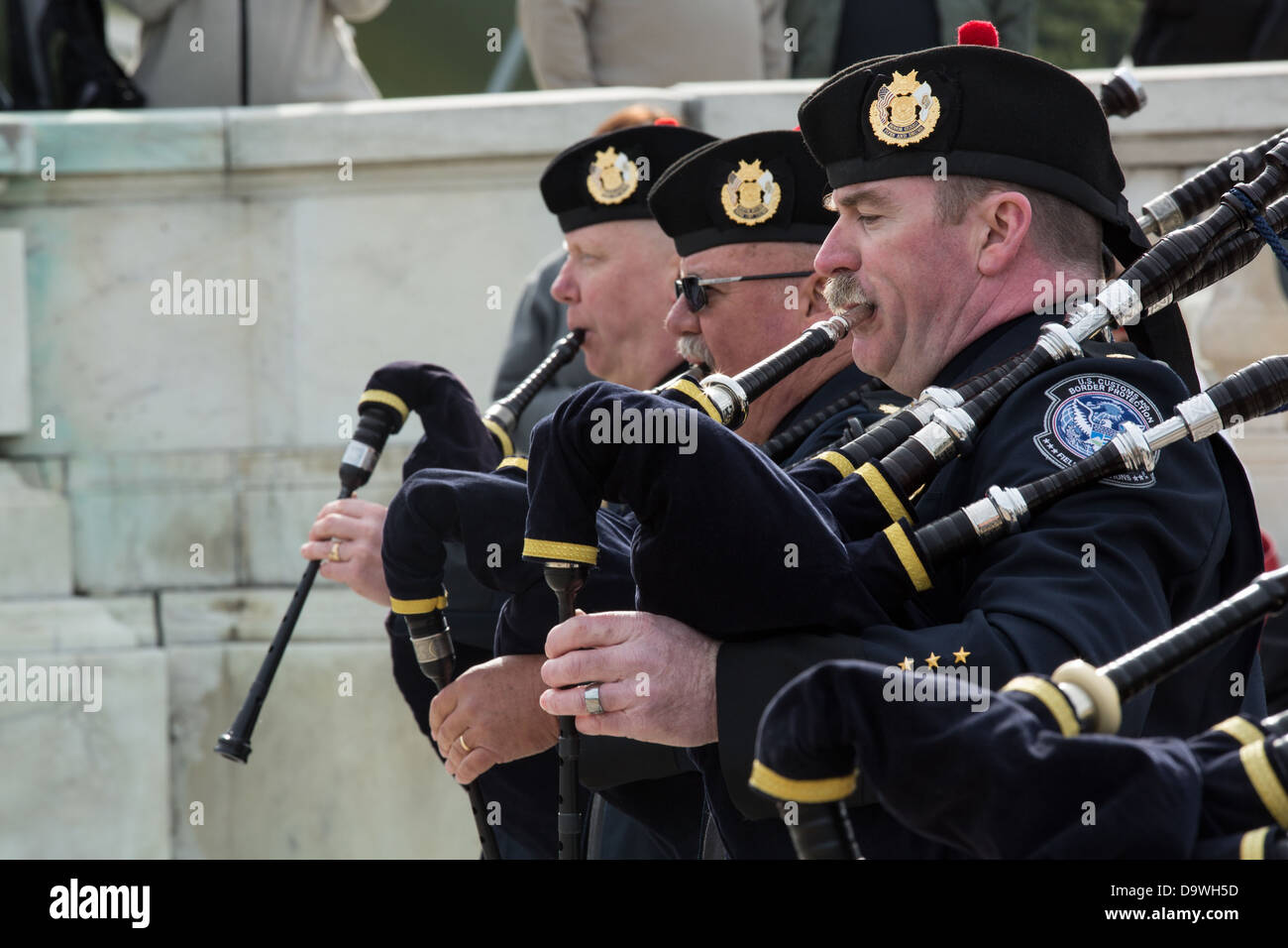 A photograph of U.S. Customs and Border Protection (CBP) officers ...