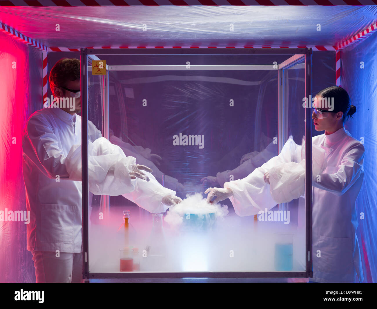 Mixing chemicals in beaker hi-res stock photography and images - Alamy