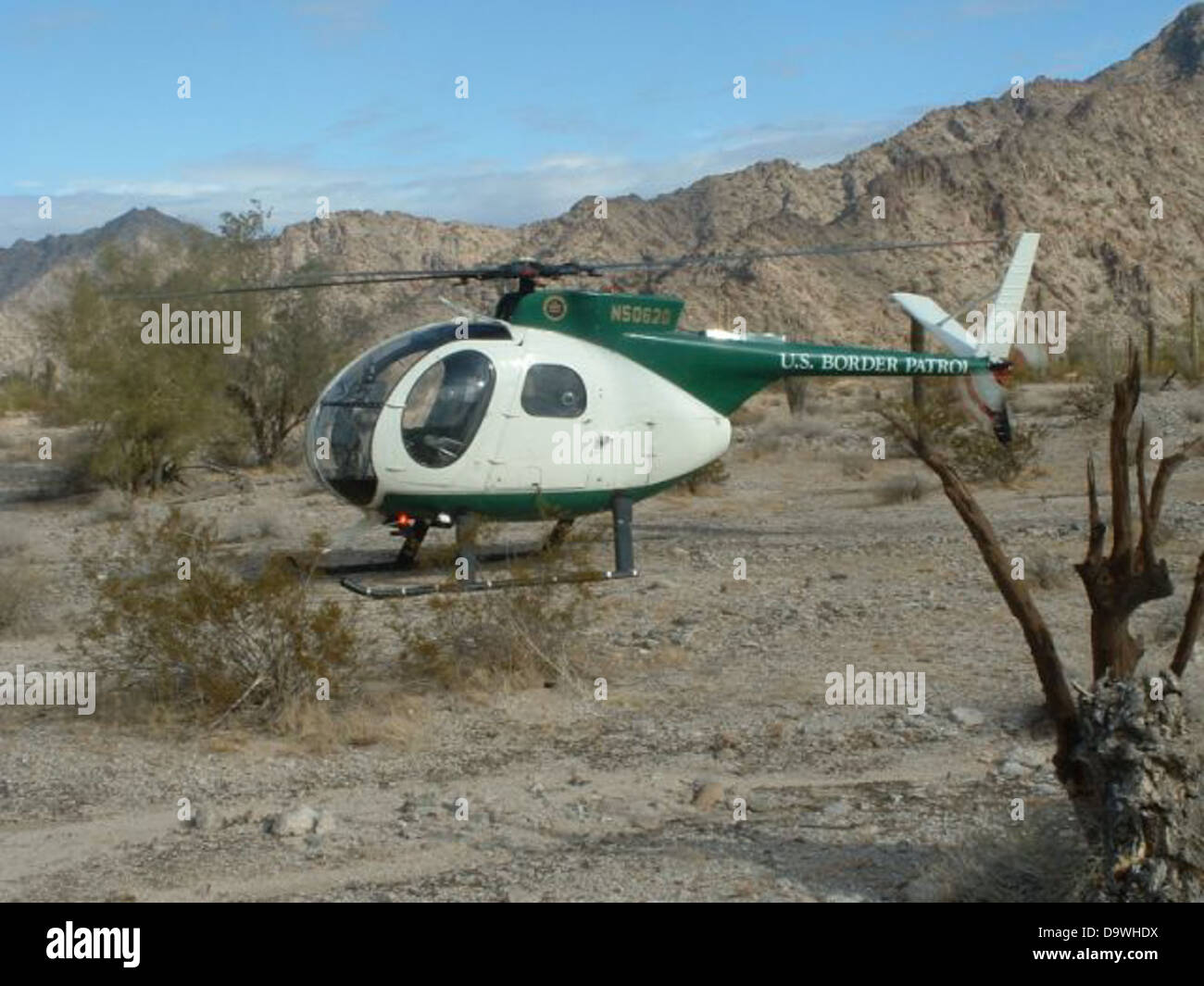 The image captures a U.S. Customs and Border Protection (CBP) operation ...