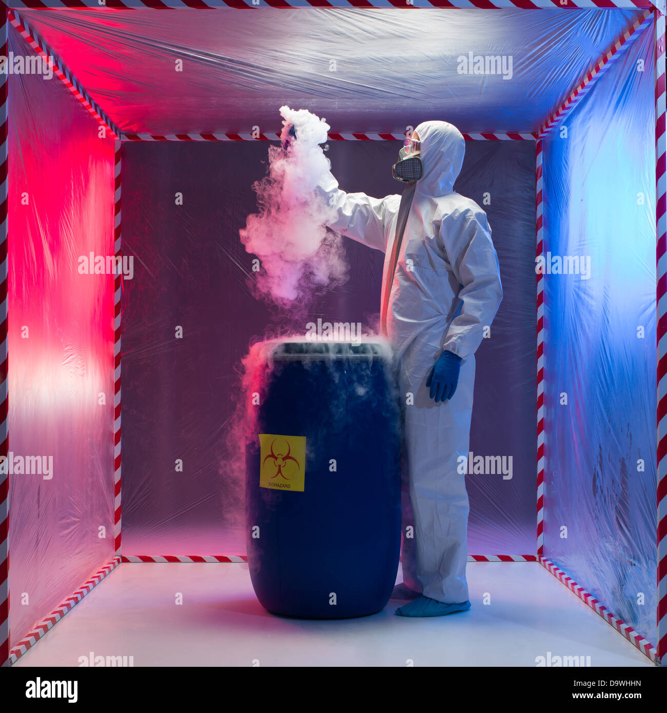 Laboratory technician working with a biohazardous sample inside an ...