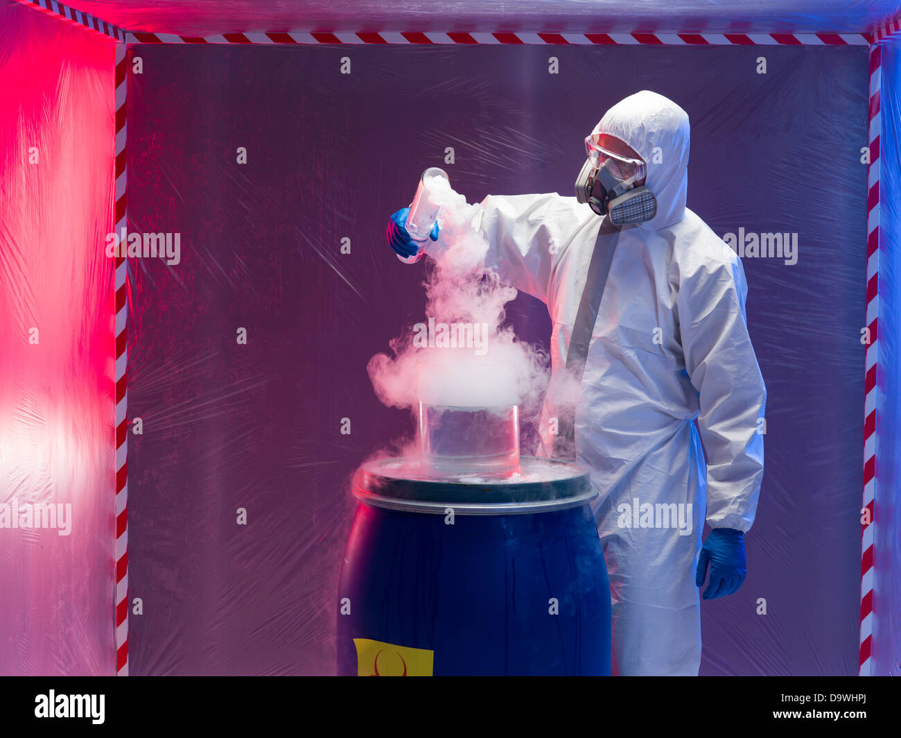 person in a protective suit and gas mask experimenting with steaming ...