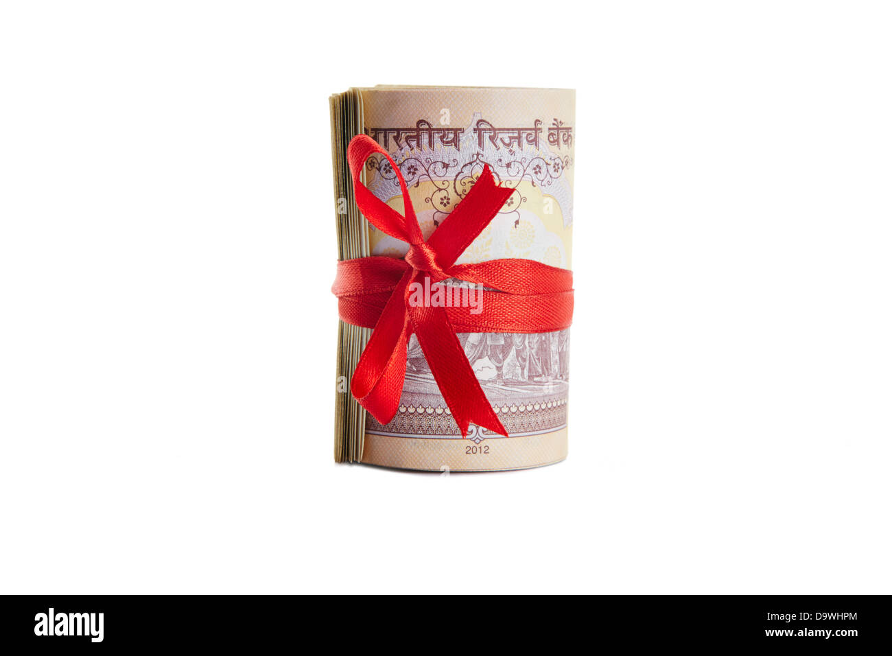 Roll of Indian rupee banknotes with red ribbon Stock Photo - Alamy