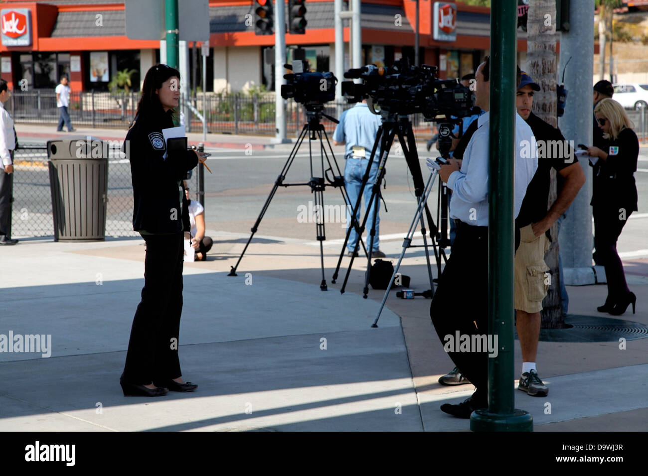 A photograph depicting U.S. Customs and Border Protection personnel ...