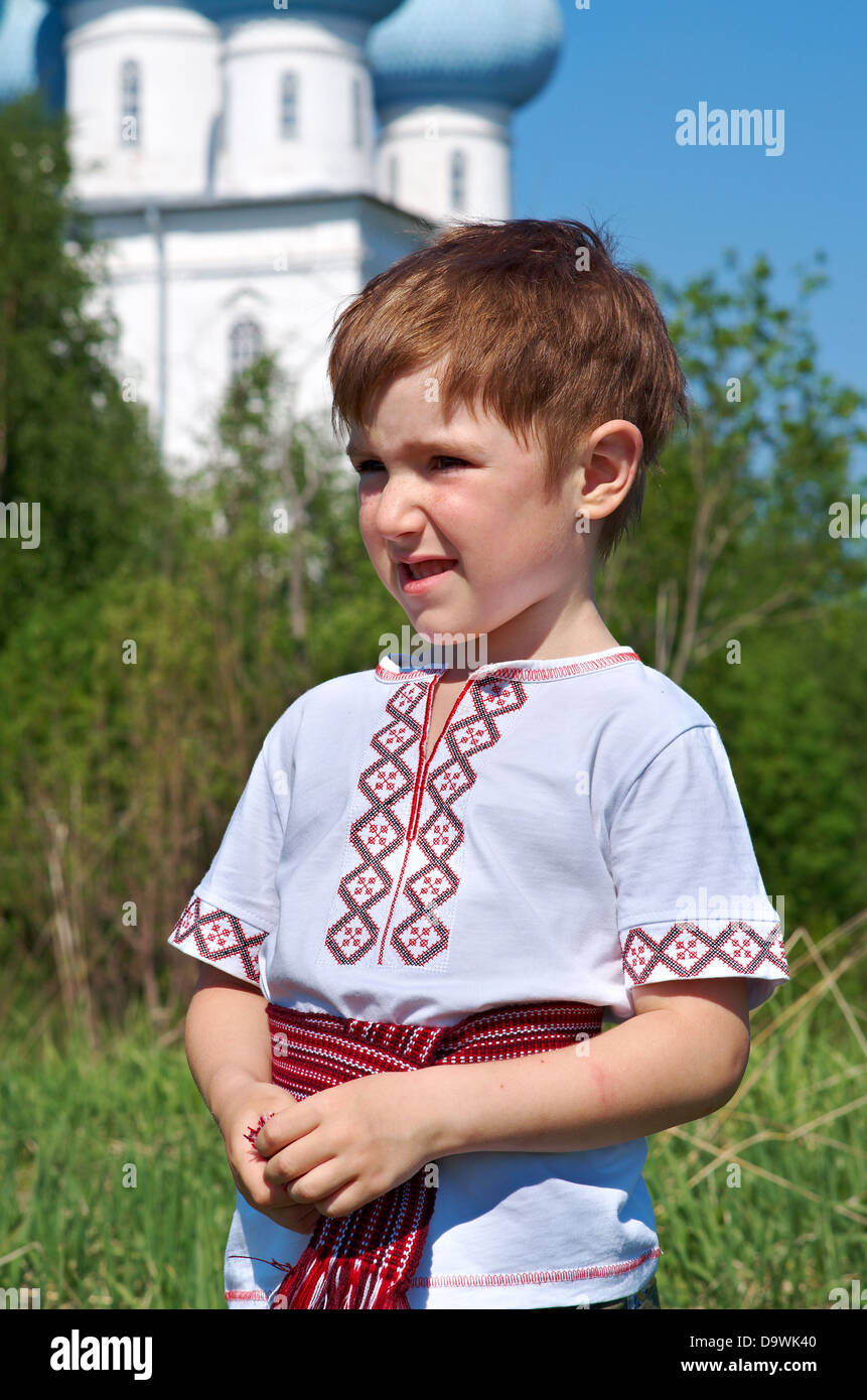 Russian little boy on a orthodox church background Stock Photo - Alamy
