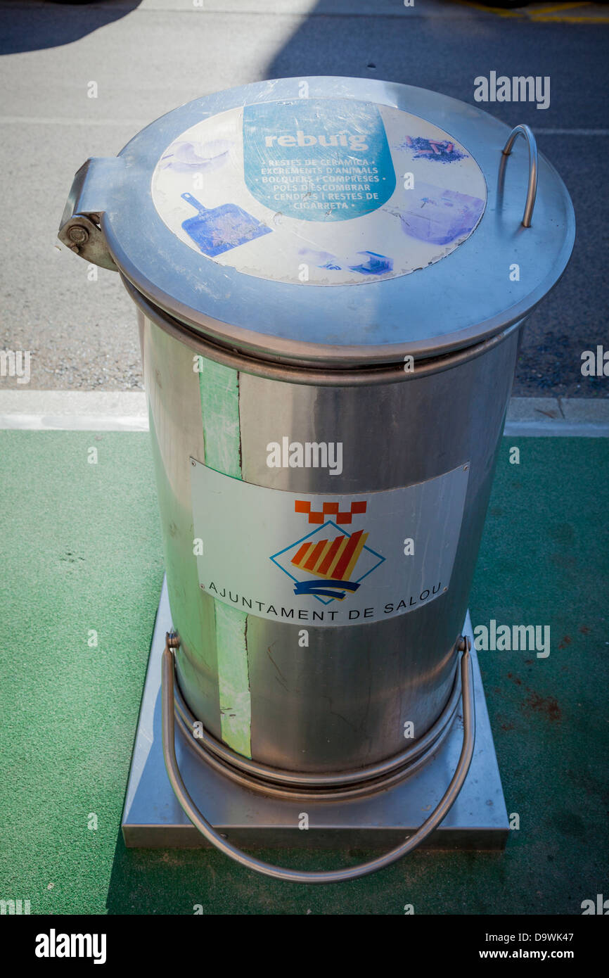 animal excrement, nappies and rejected rubbish bin on spanish street ...