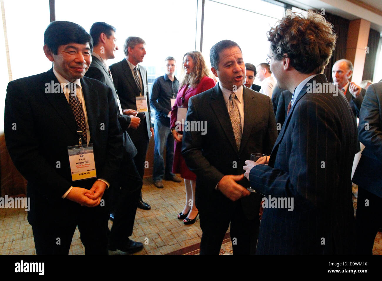 This photograph captures a reception hosted by the World Customs ...