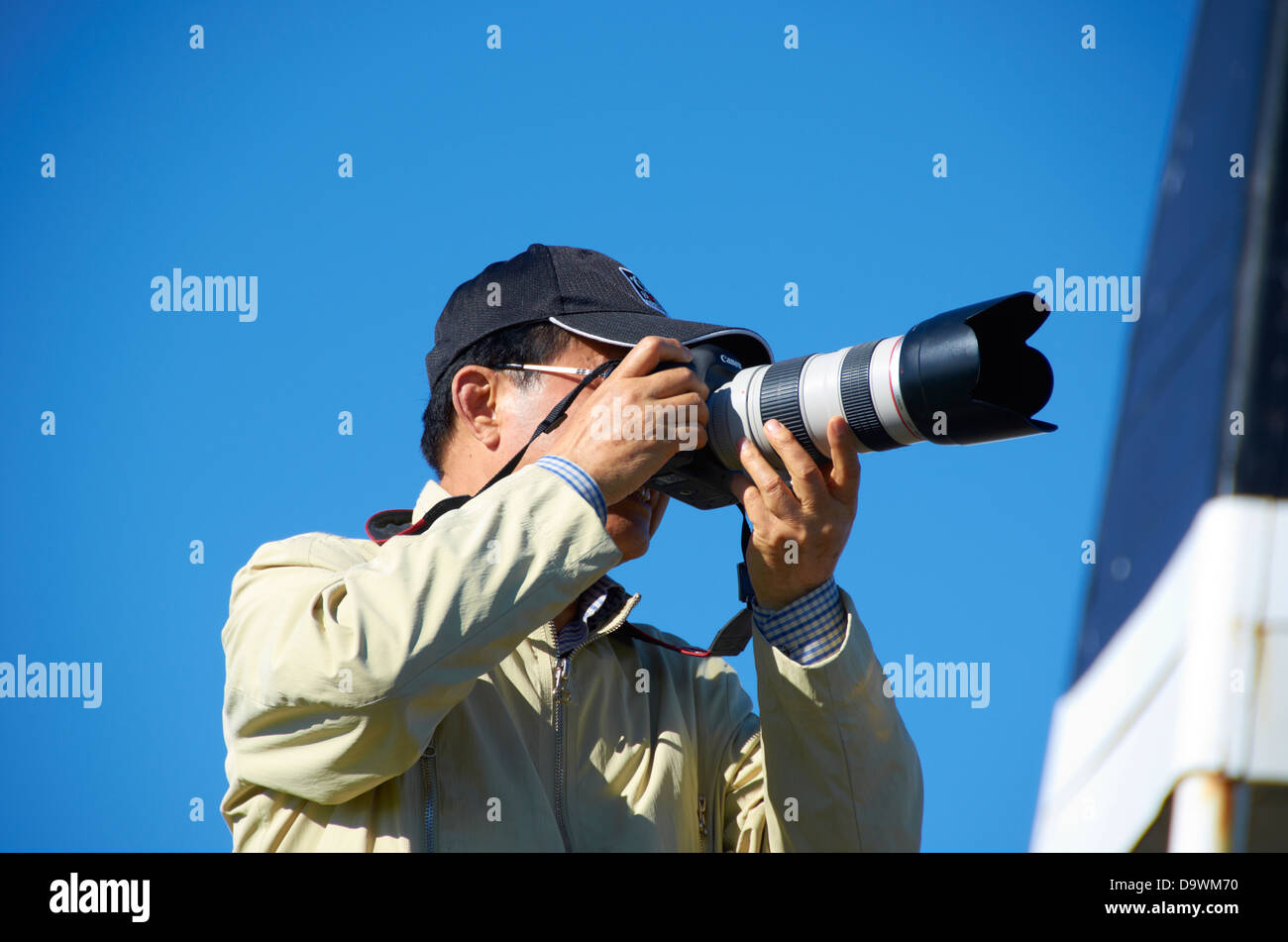 Japanese Tourist With Camera