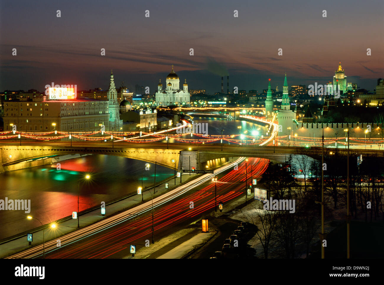 City skyline and the Moskva River at dusk, Moscow, Russia Stock Photo ...
