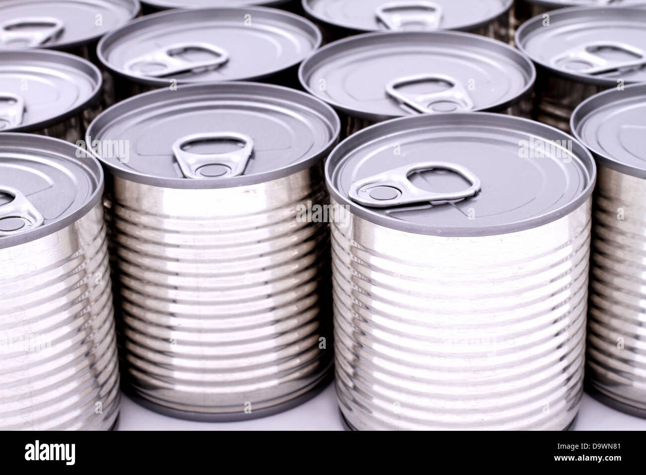 A group of cans isolated background Stock Photo - Alamy