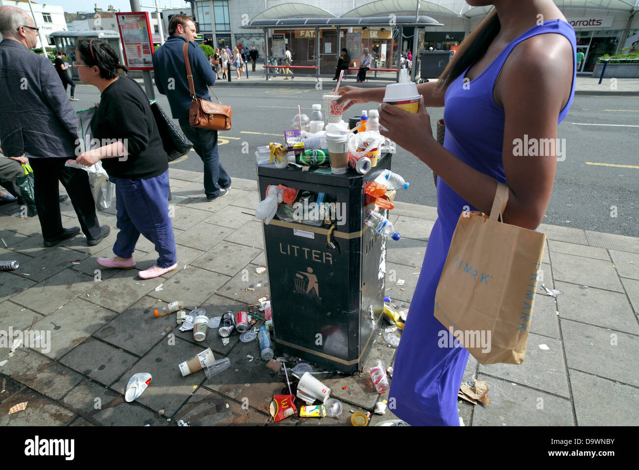 Person littering hi-res stock photography and images - Alamy