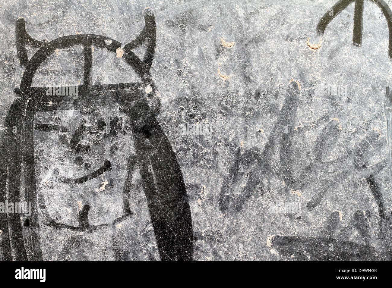 A vicking drawn on a dirty shop window Stock Photo - Alamy