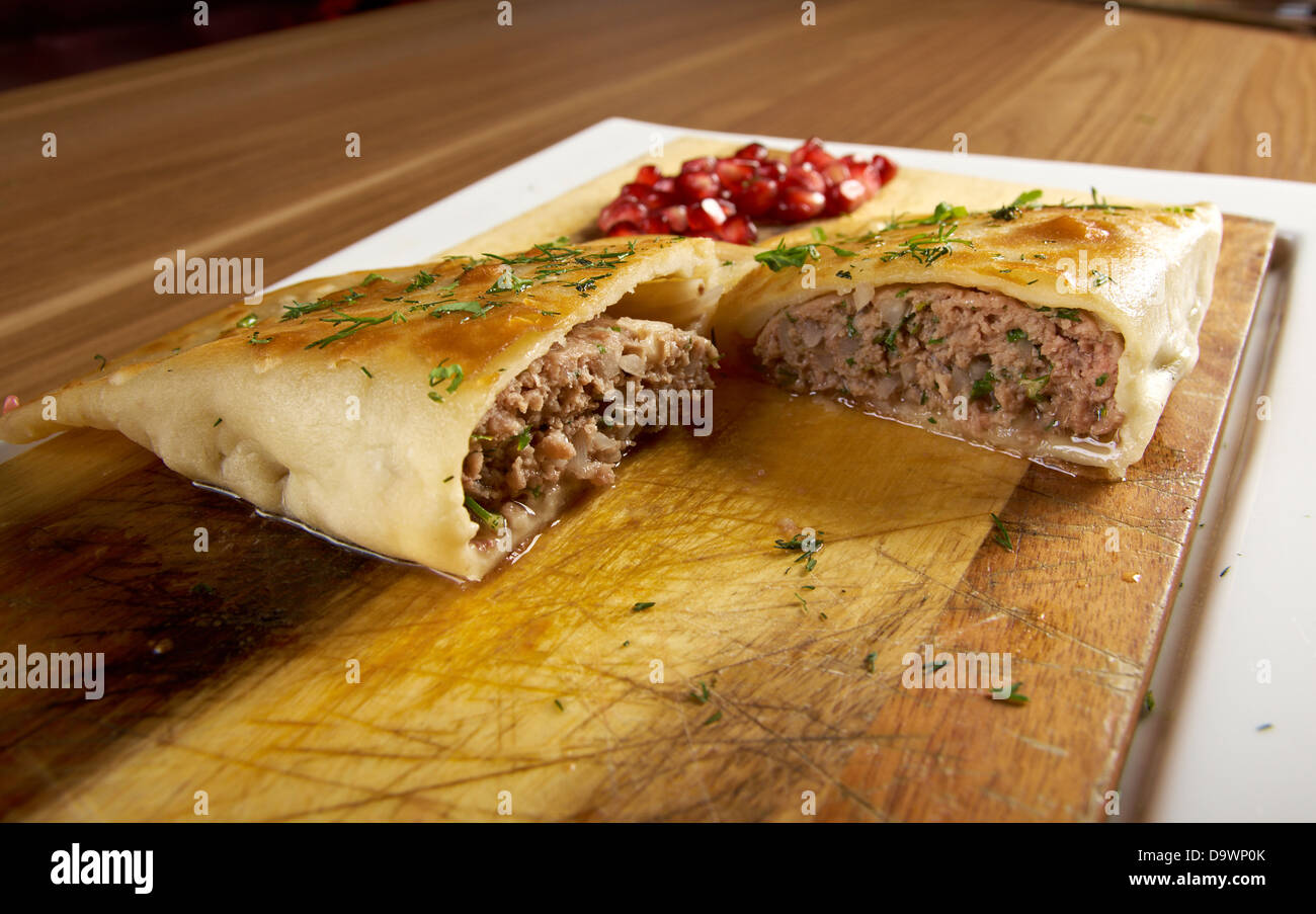 Qutab- baked Chebureki traditional georgian meat pastry.meat in a pitta ...