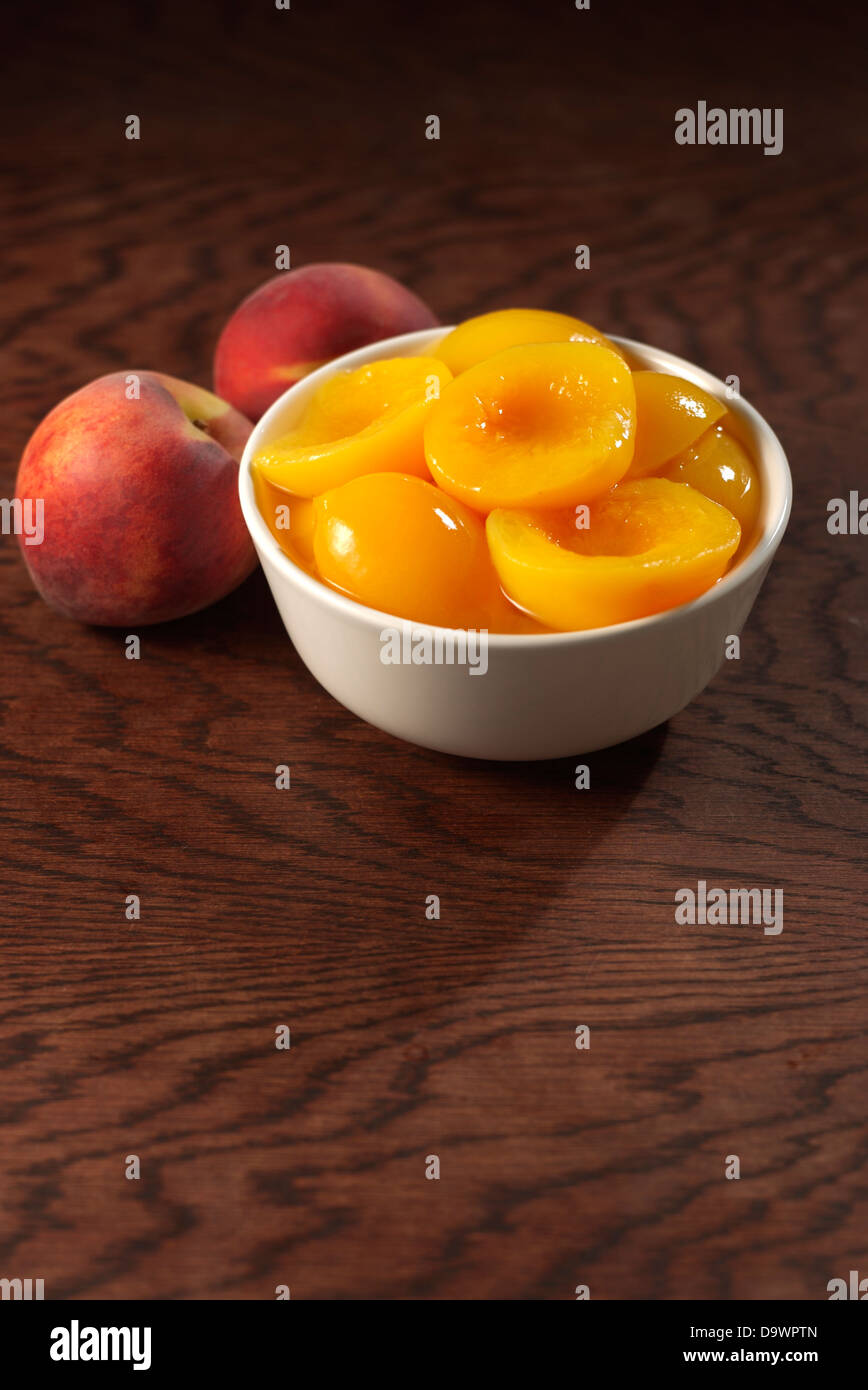 peeled peaches bowl Stock Photo - Alamy