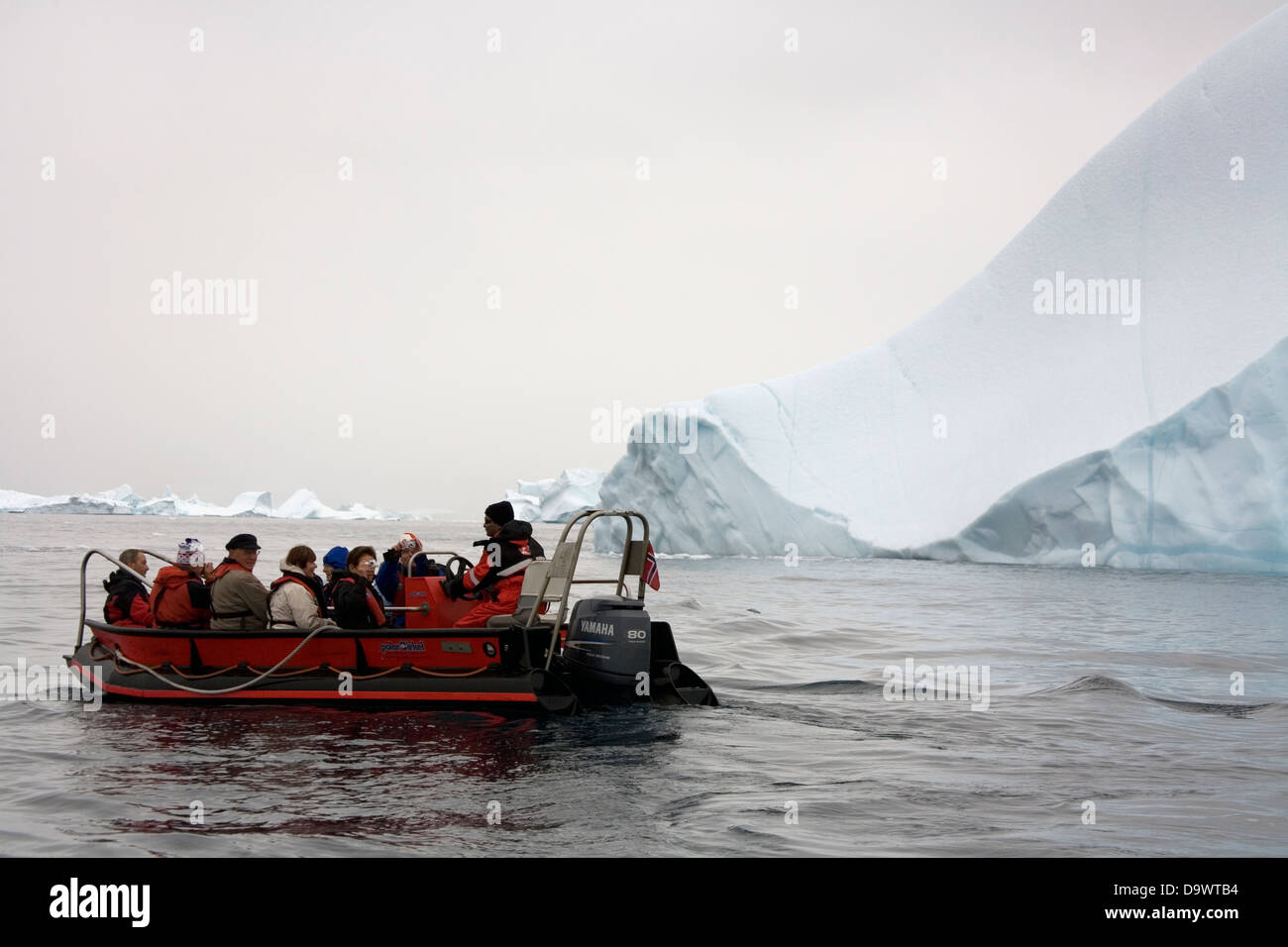 A Polar Circle boat from MS FRAM carries passengers for a close-up look ...