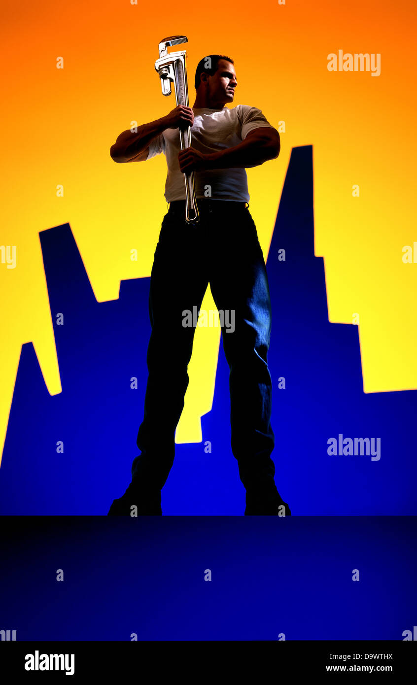 man holding a tool Stock Photo - Alamy