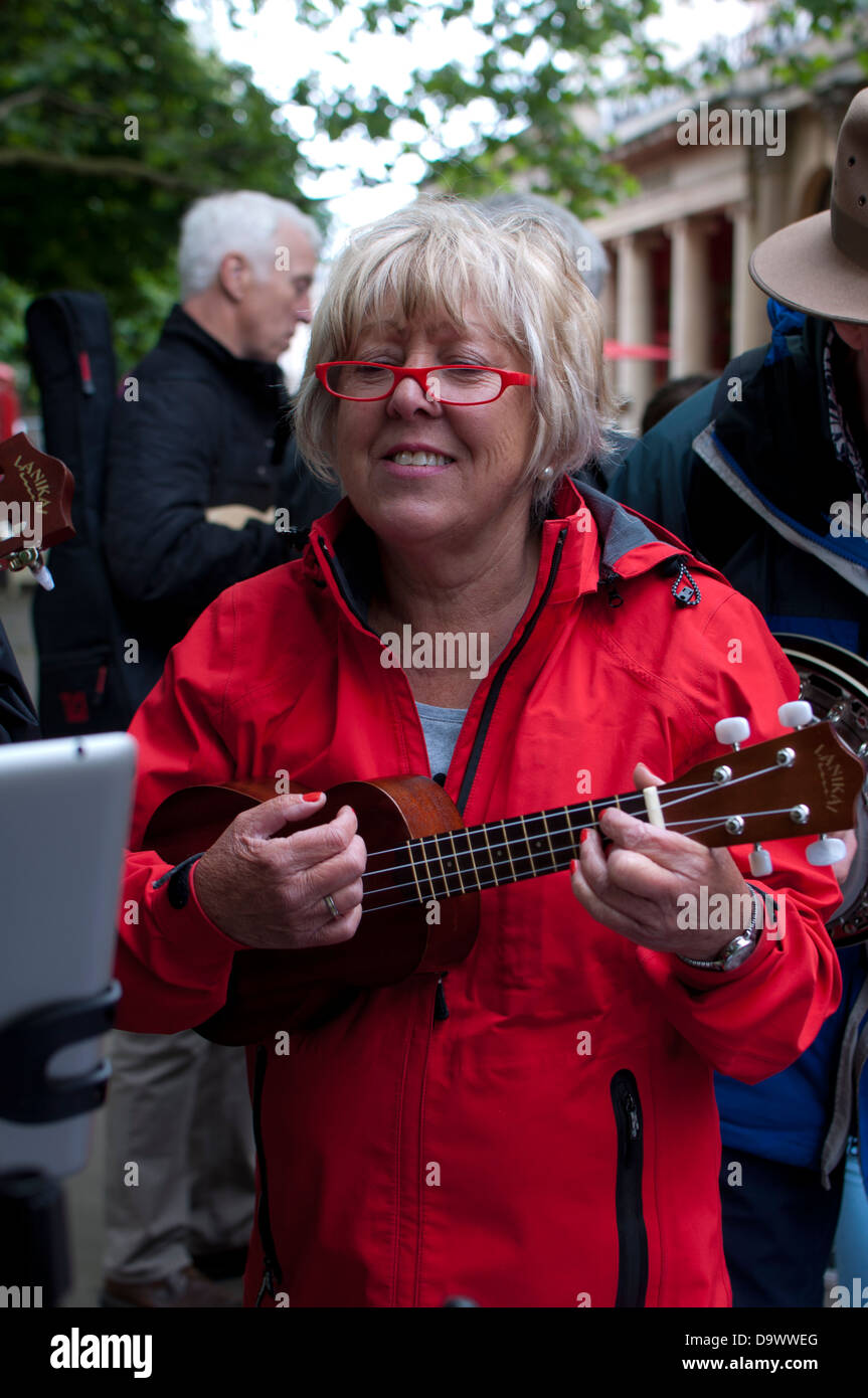 Lady playing ukulele hi-res stock photography and images - Alamy