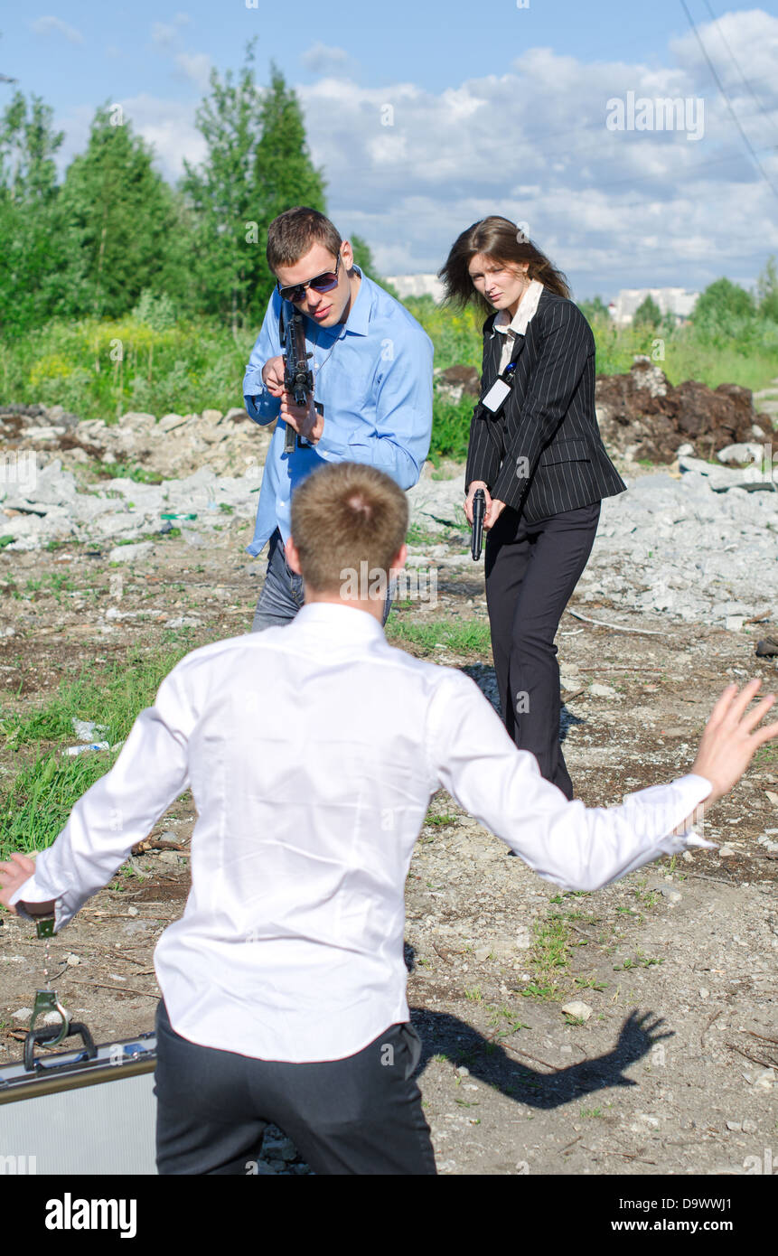 Two FBI agents conduct arrest of an offender with the gun Stock Photo ...