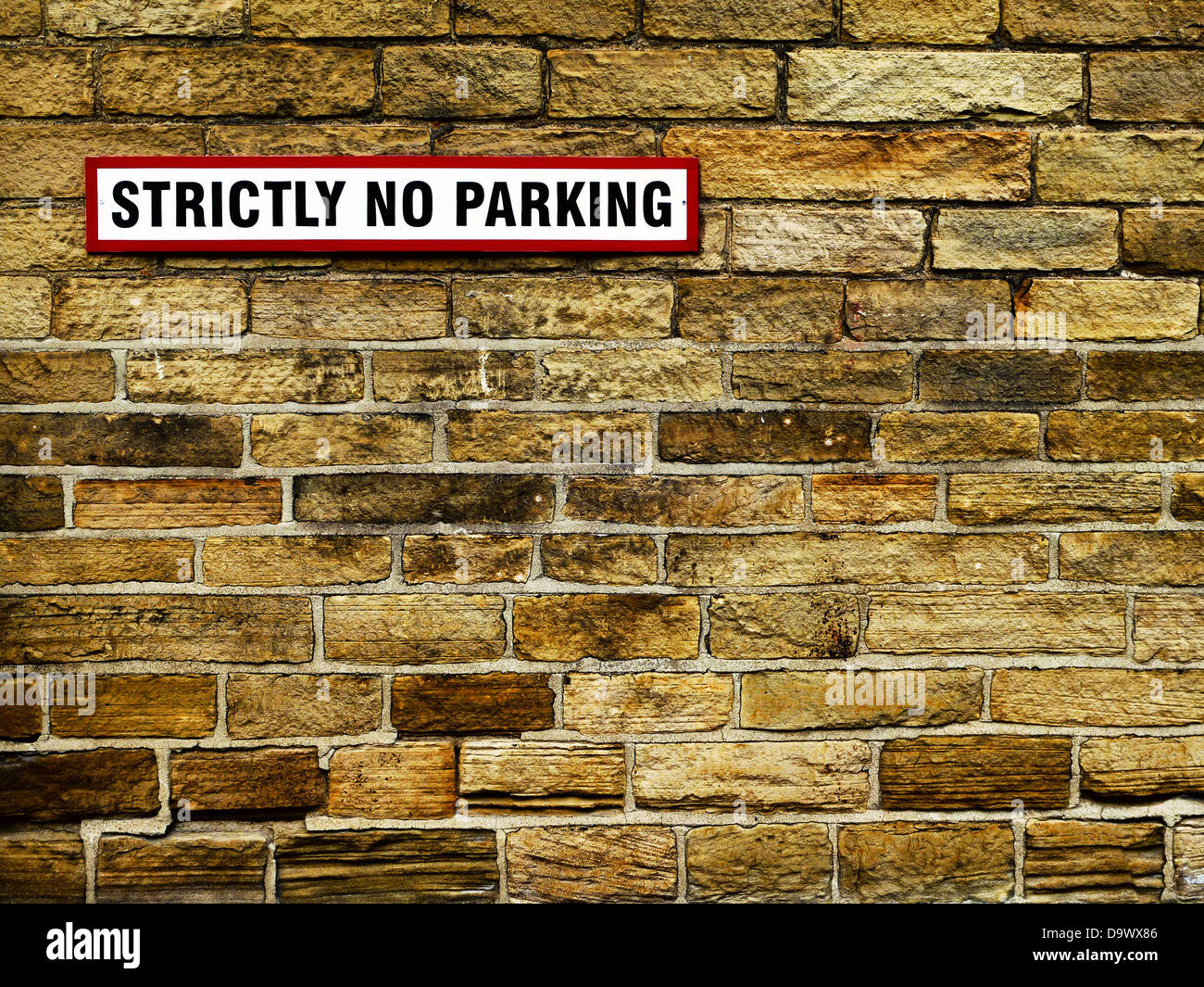 Brick bricks sign wall warning hi-res stock photography and images - Alamy