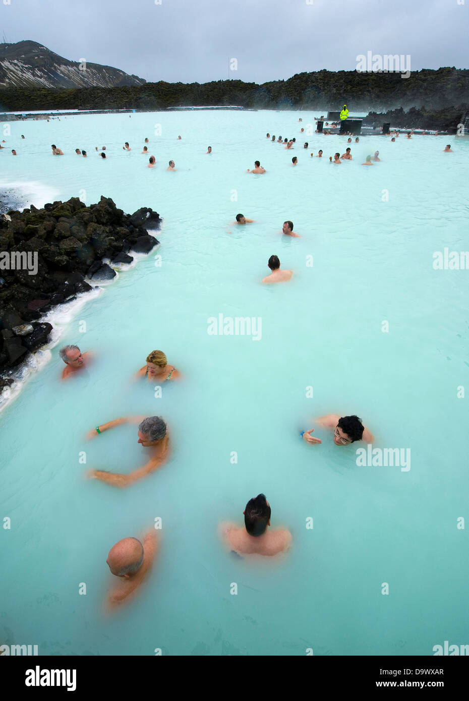 People bathing in the Blue Lagoon geothermal bath resort in Iceland ...