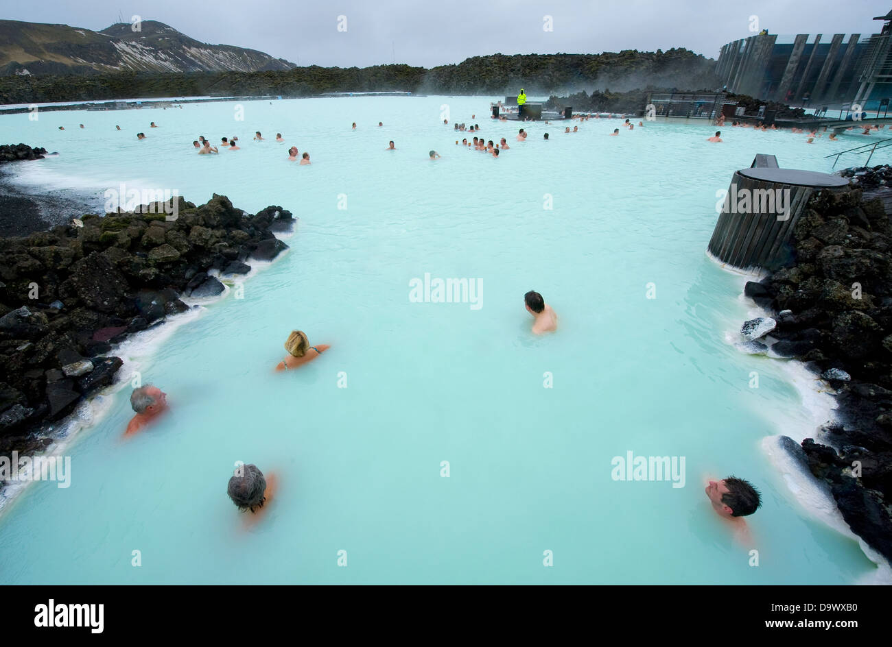 People bathing in the Blue Lagoon geothermal bath resort in Iceland ...