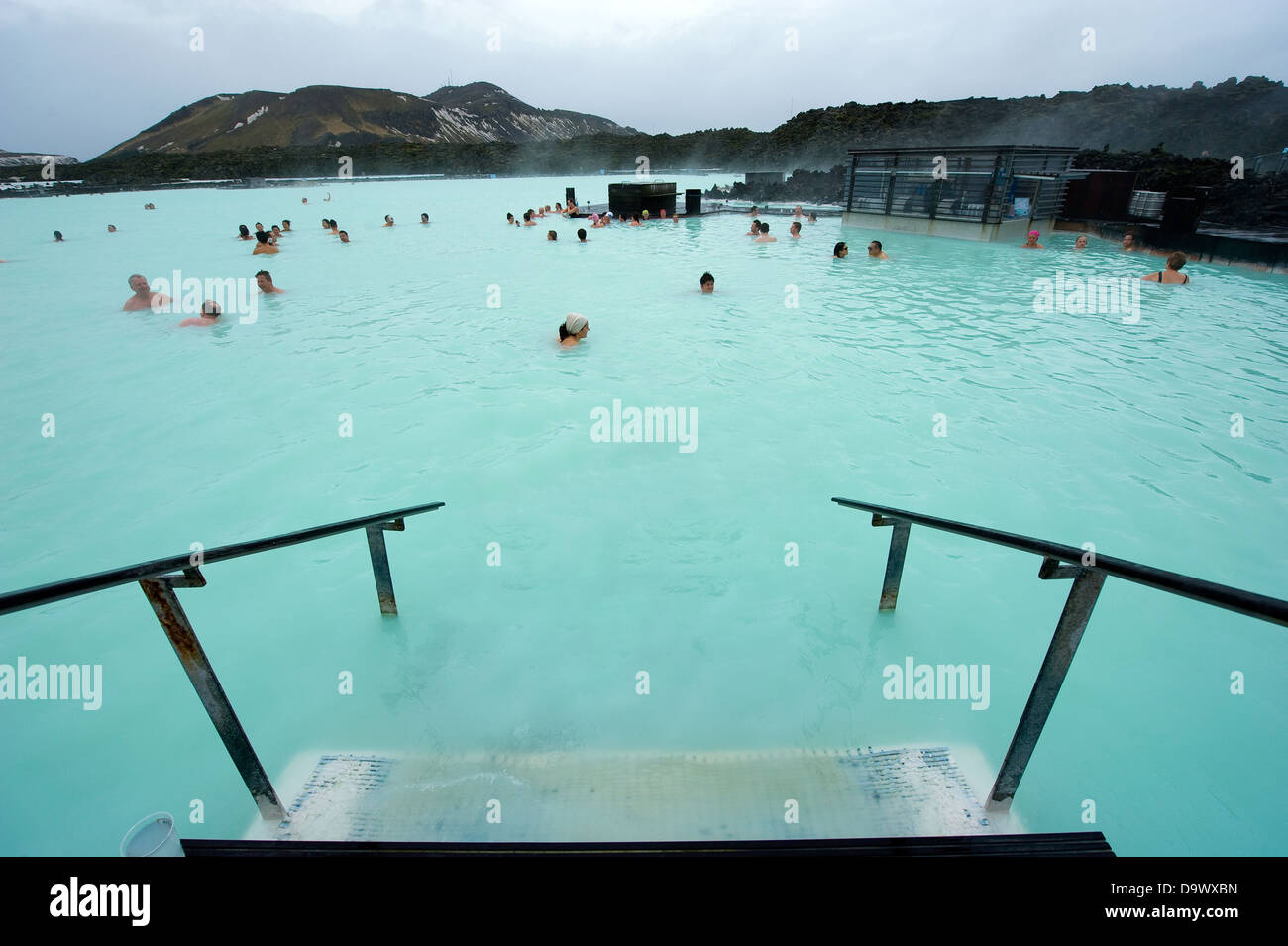 People bathing in the Blue Lagoon geothermal bath resort in Iceland ...