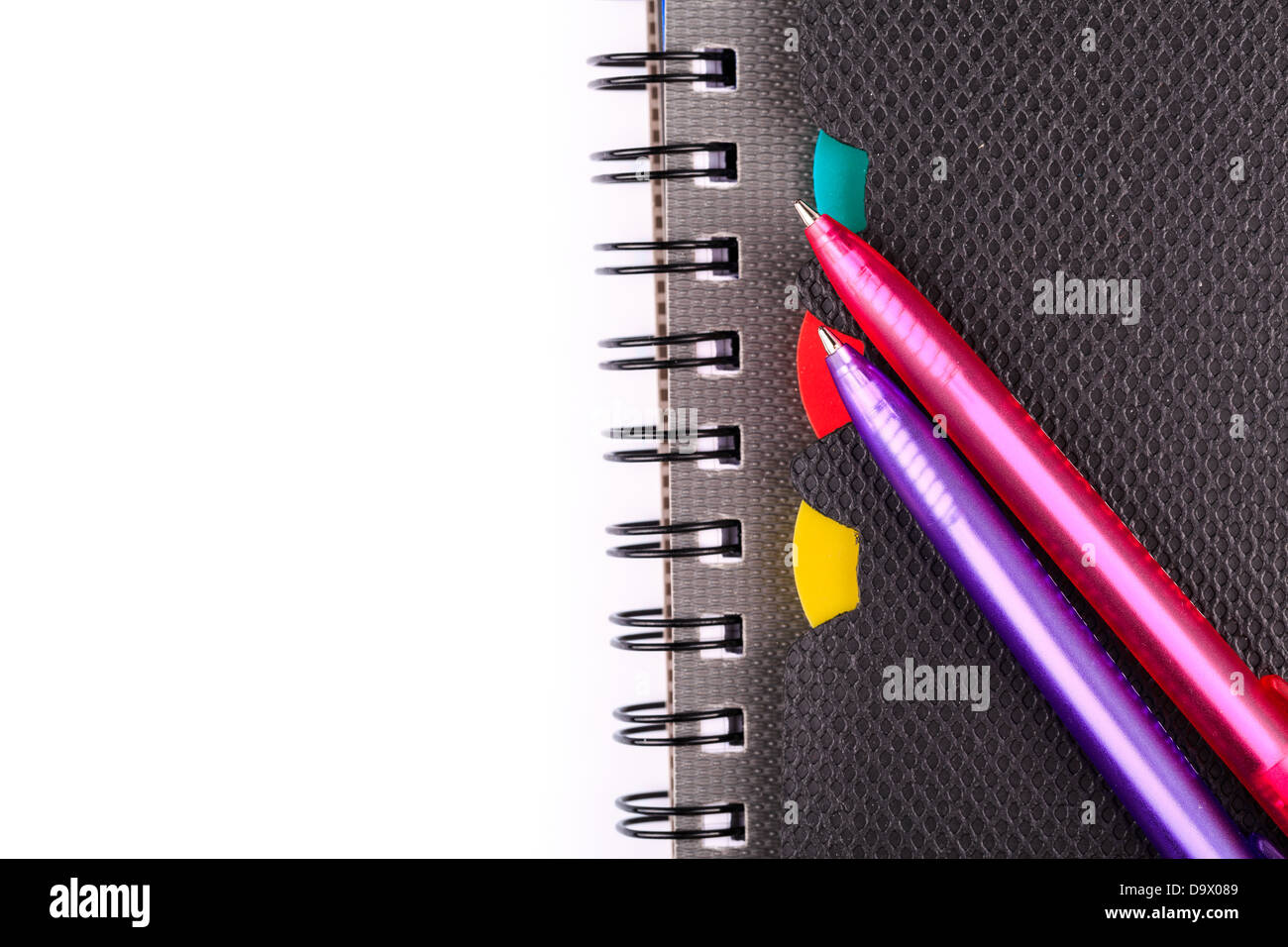 Note book for taking notes with a pen isolated on white Stock Photo - Alamy