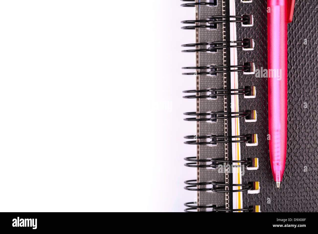 Note book for taking notes with a pen isolated on white Stock Photo - Alamy