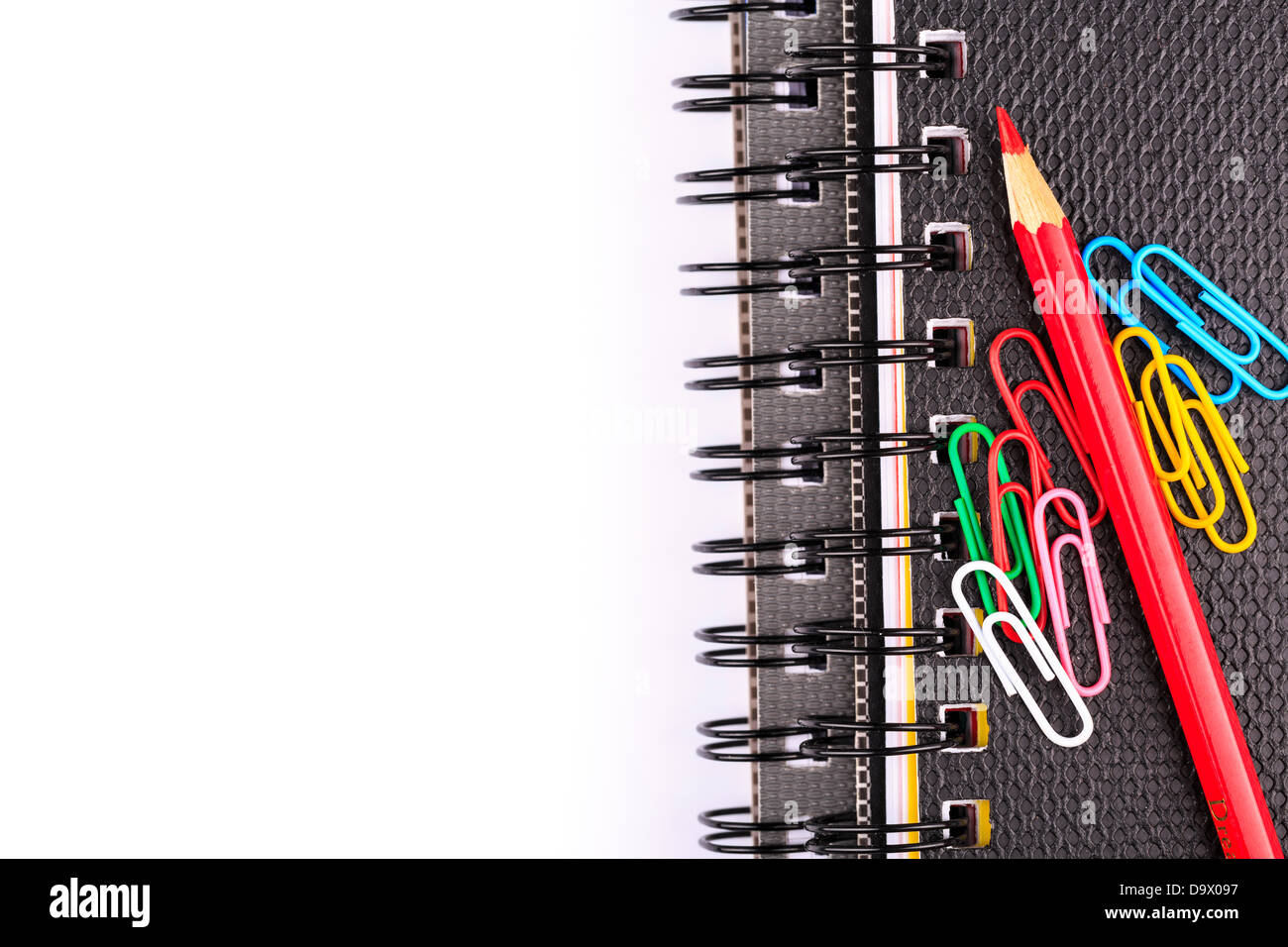 Note book for taking notes with a pen isolated on white Stock Photo - Alamy