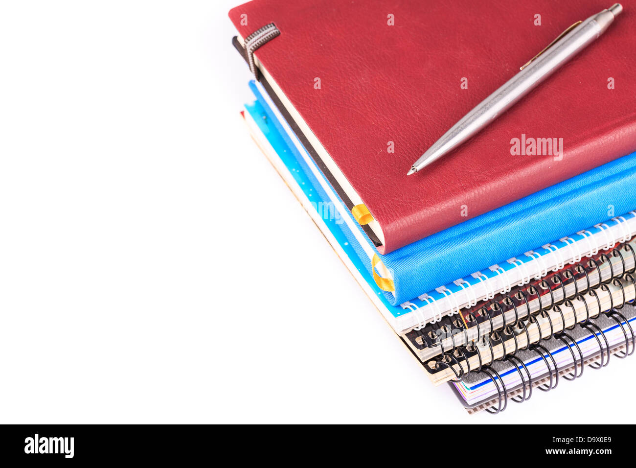 Note book for taking notes with a pen isolated on white Stock Photo - Alamy