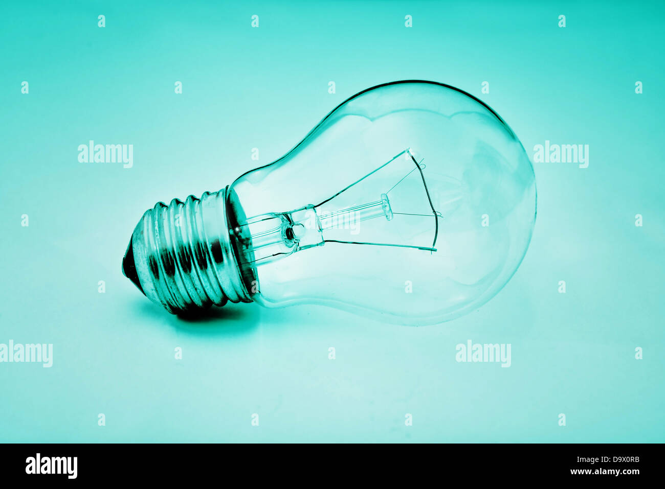 light bulb. Classic light bulb on blue background Stock Photo - Alamy