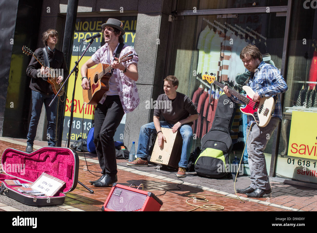 Band performs on a street Stock Photo - Alamy