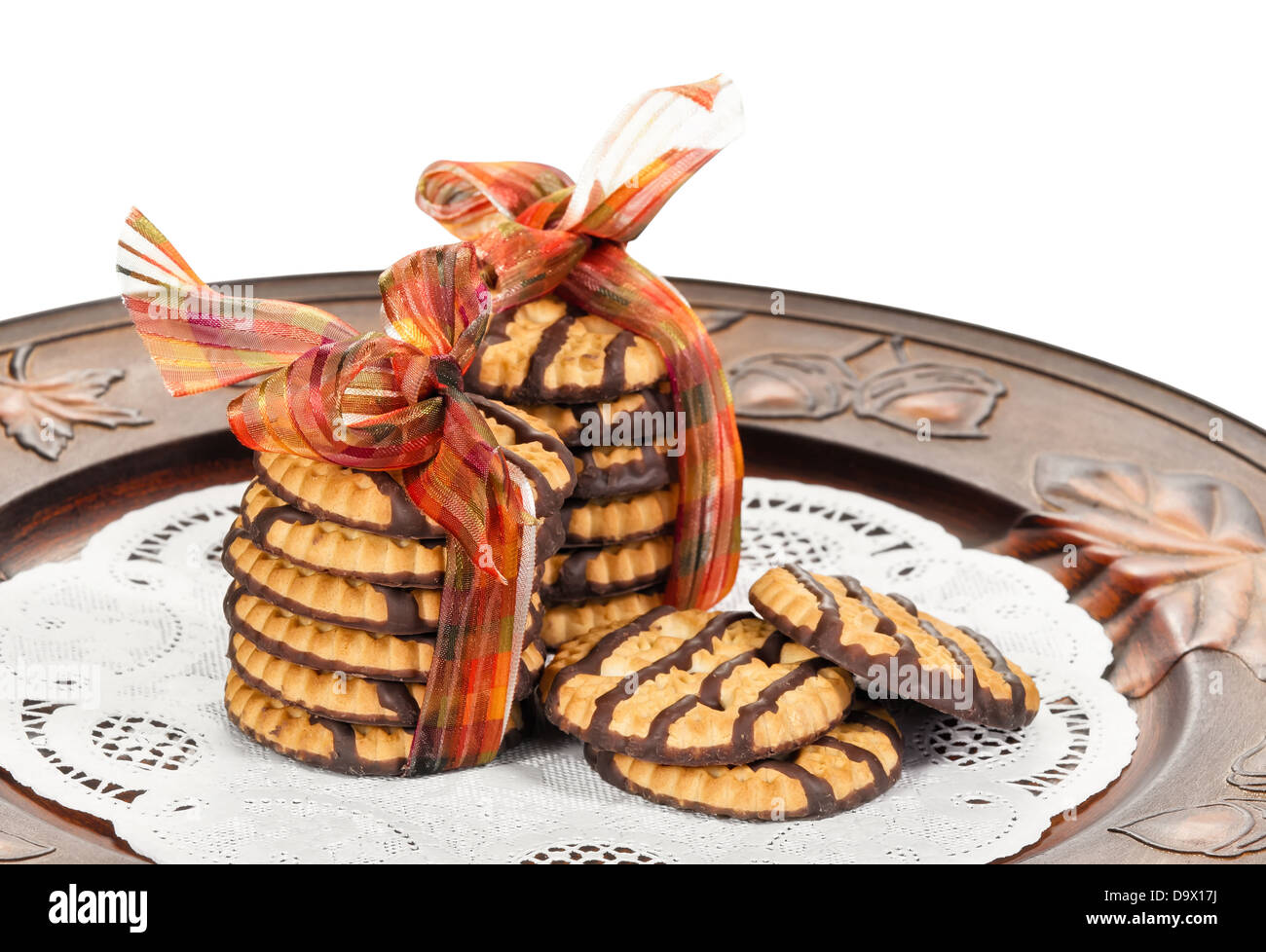 Chocolate fudge striped shortbread cookies wrapped in ribbon in autumn ...