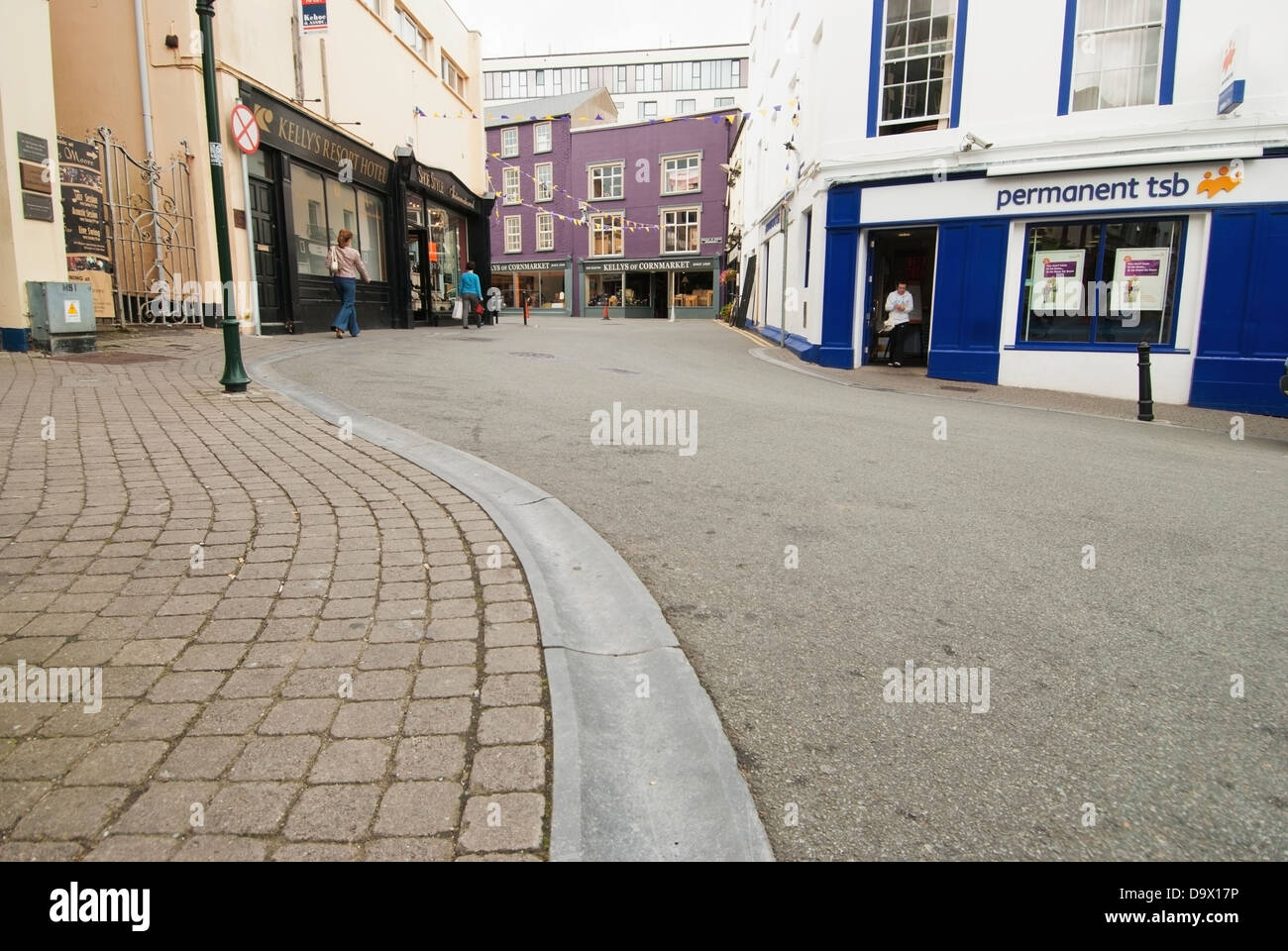 Pedestrians On A Street With Colourful Buildings; Ireland Stock Photo ...