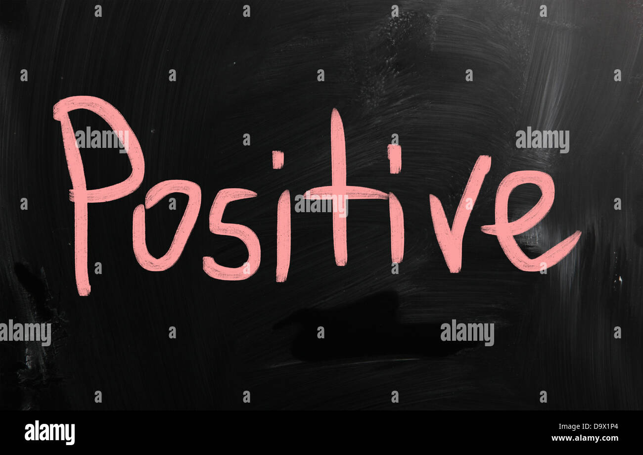 positive handwritten with white chalk on a blackboard Stock Photo - Alamy