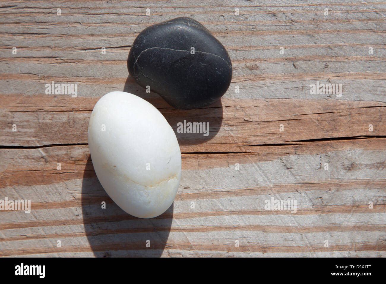 jack stones on the wood plate Stock Photo - Alamy