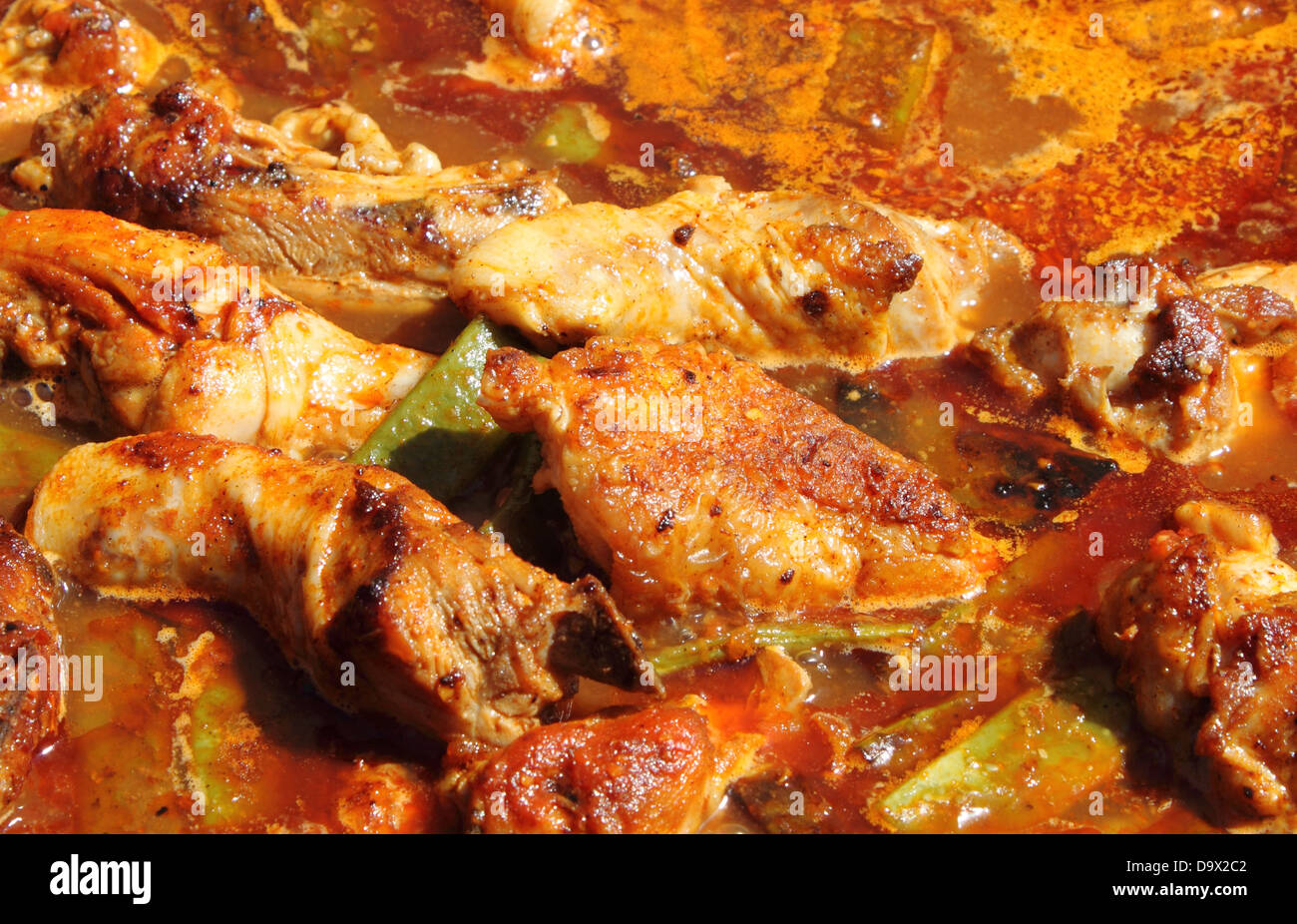 Closeup of creole chicken Louisiana style cooking in a pan Stock Photo ...