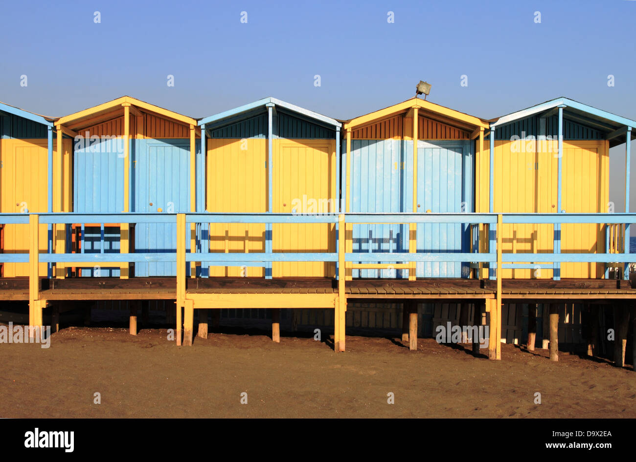 Colourful bathing boxes on the beach in a row Stock Photo - Alamy