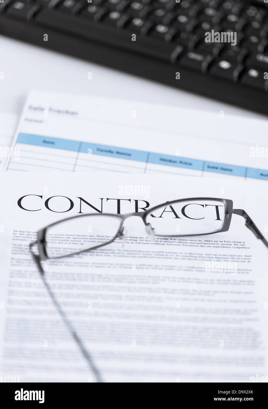 signed contract paper with glasses Stock Photo - Alamy