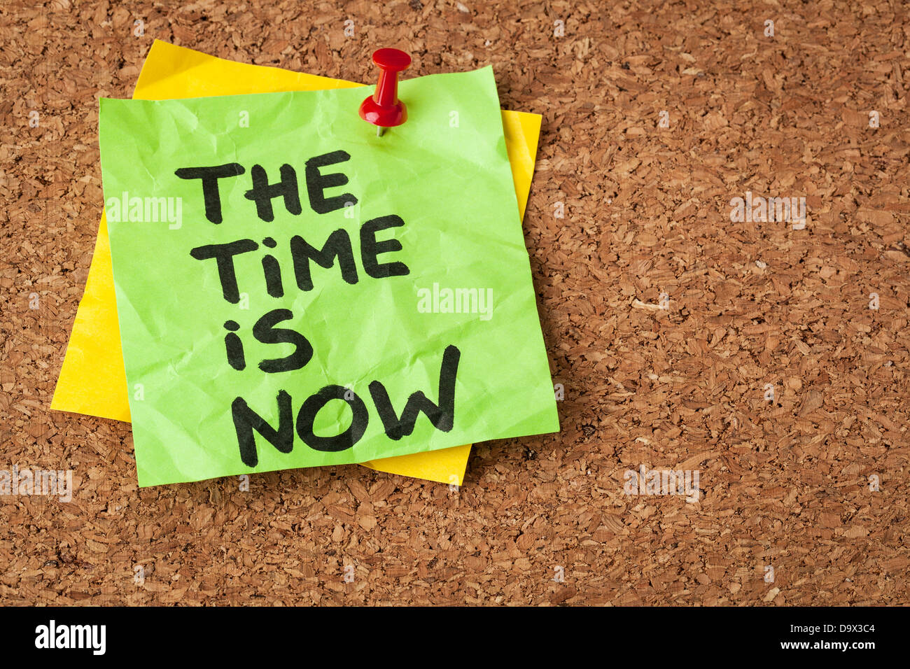 the time is now - motivational reminder on a green sticky note Stock ...