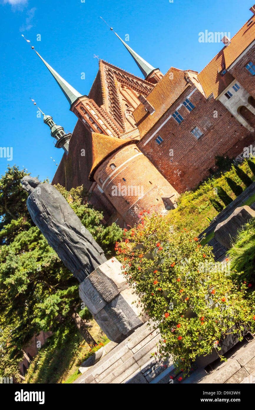 Nicolaus copernicus statue in background old cathedral in Frombork ...