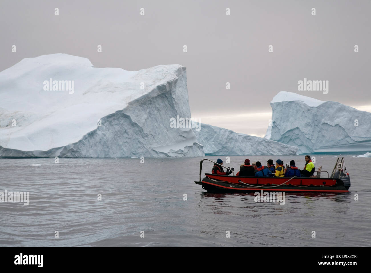 A Polar Circle boat from MS FRAM carries passengers for a close-up look ...
