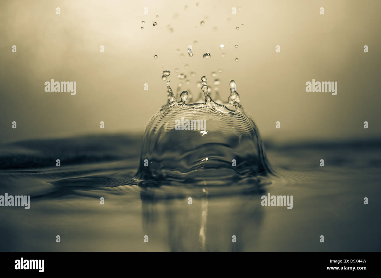 Water splash in the vintage color concept background Stock Photo - Alamy