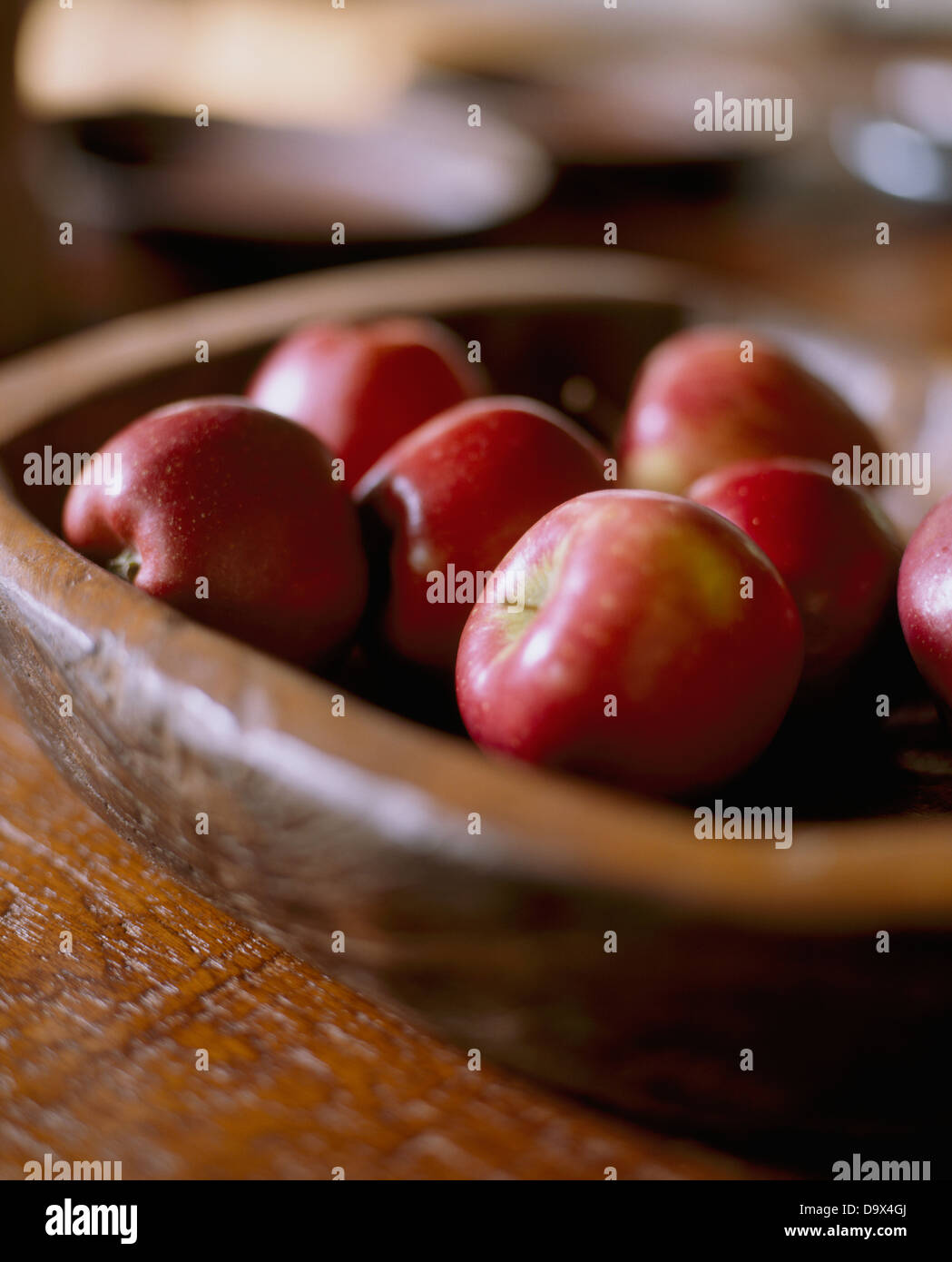 Wooden bowl with red apples Stock Photo - Alamy