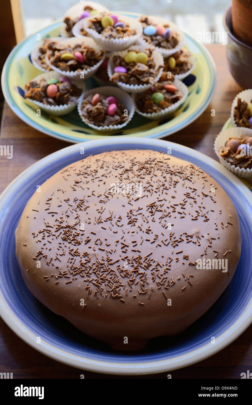 Chocolate sponge cake and chocolate covered maize flakes with coloured ...