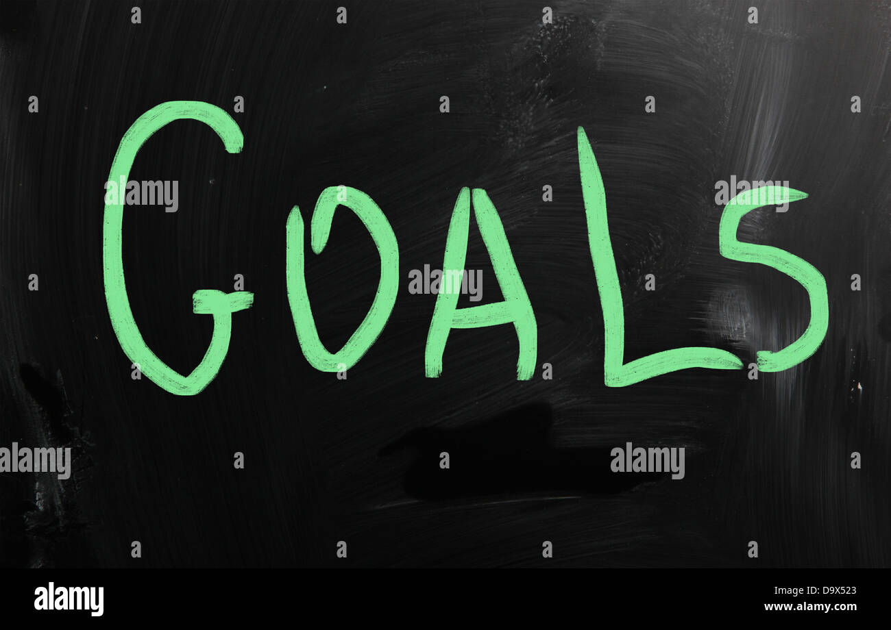 Goals handwritten with white chalk on a blackboard Stock Photo - Alamy