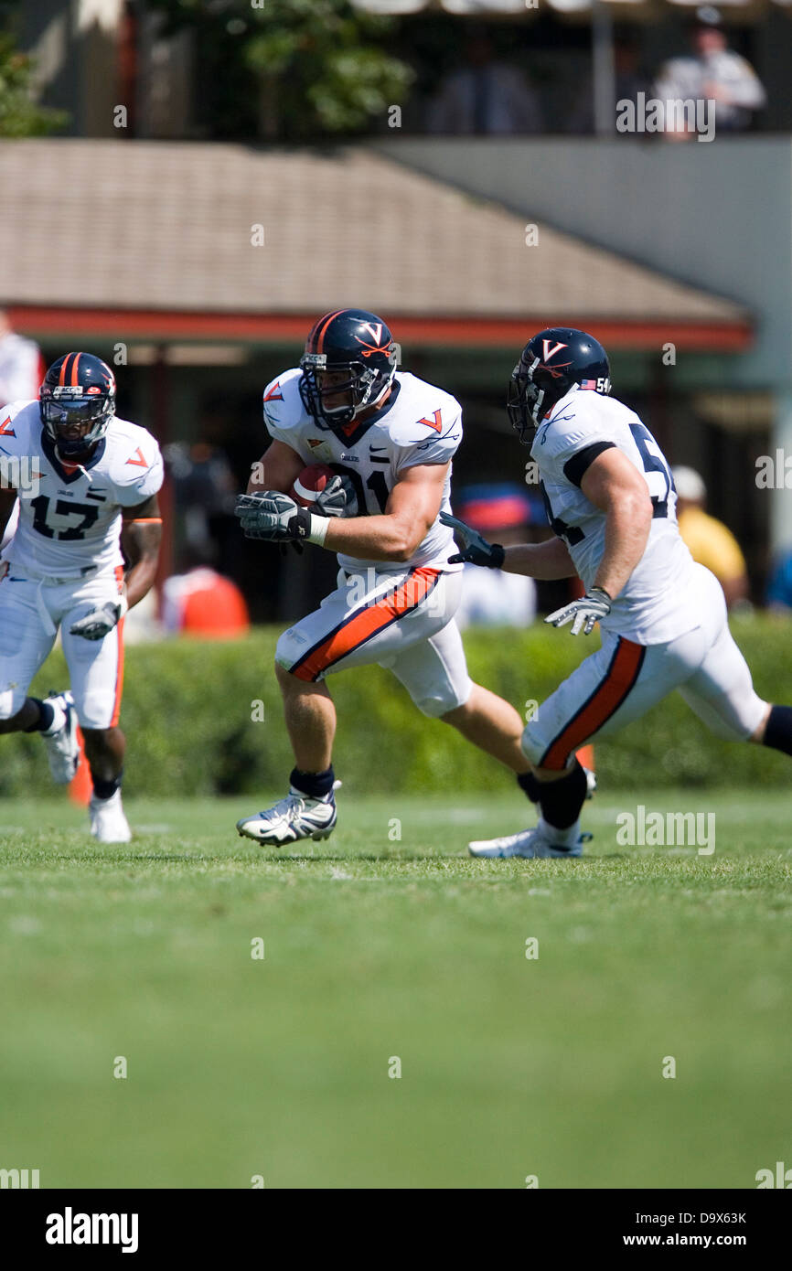Virginia defensive end Chris Long (91) returns an interception at Kenan ...