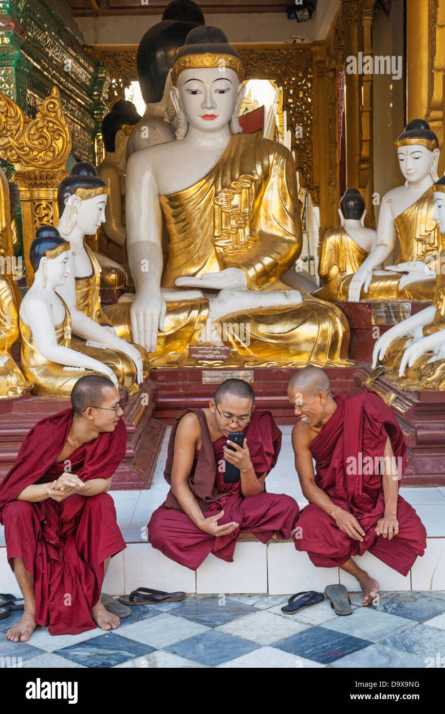 Myanmar,Yangon,Shwedagon Pagoda,Monks with Mobile Phone Stock Photo - Alamy