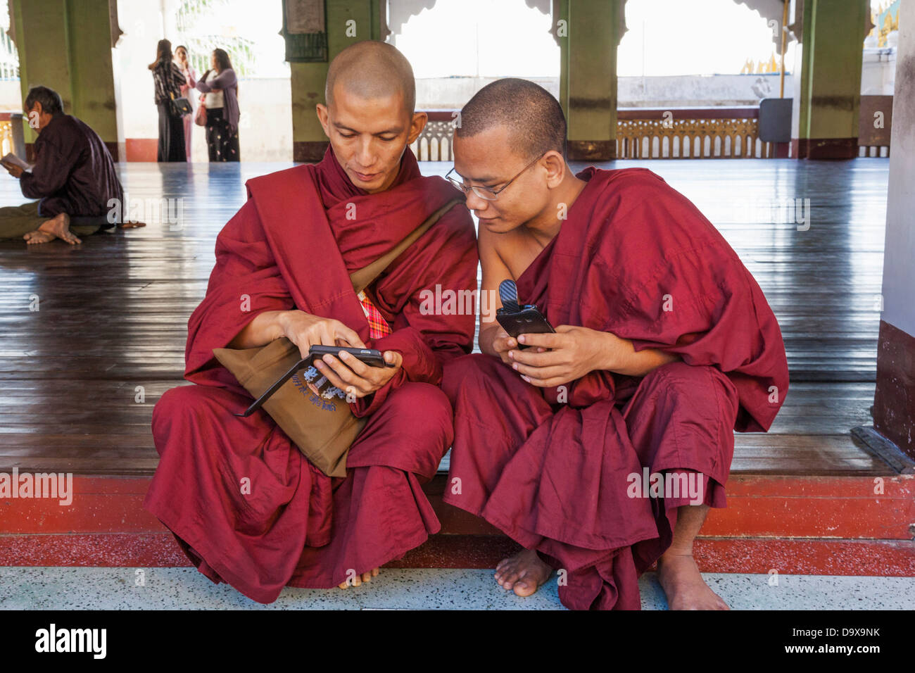 Myanmar,Yangon,Shwedagon Pagoda,Monks with Mobile Phone Stock Photo - Alamy