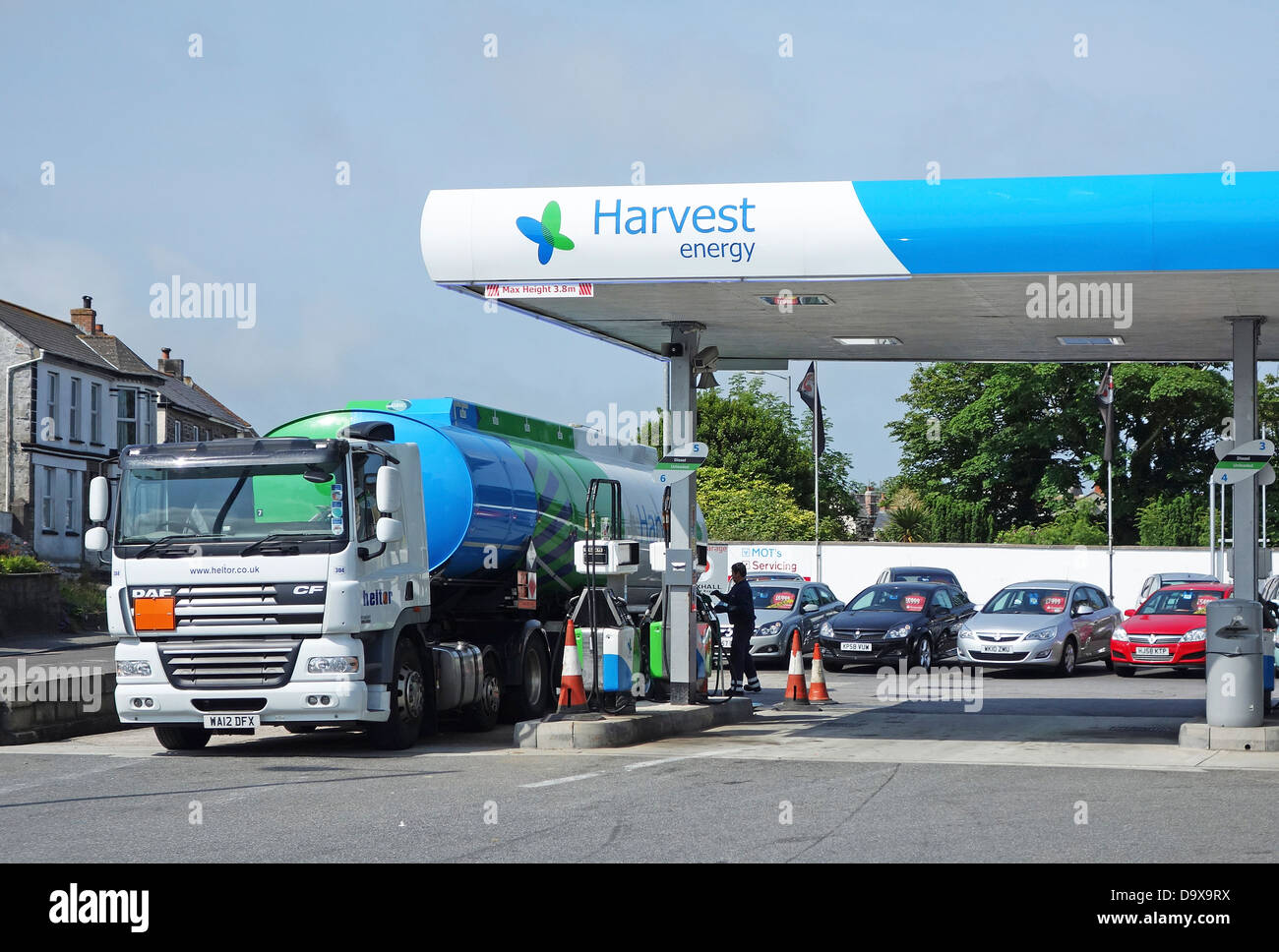 A fuel tanker at a " Harvest Energy " petrol station Stock Photo - Alamy