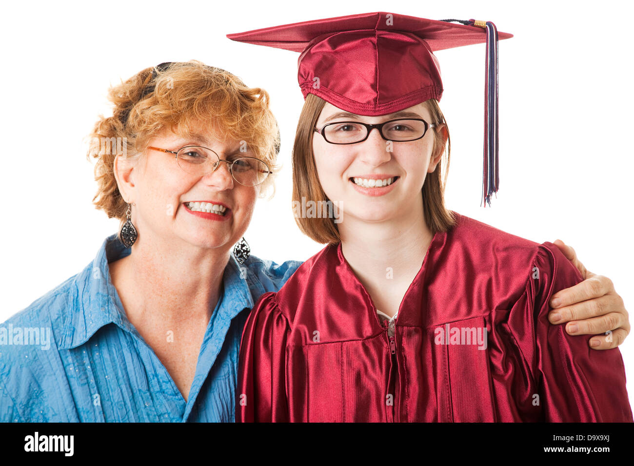 Smiling high school graduate and her proud mother. White background ...
